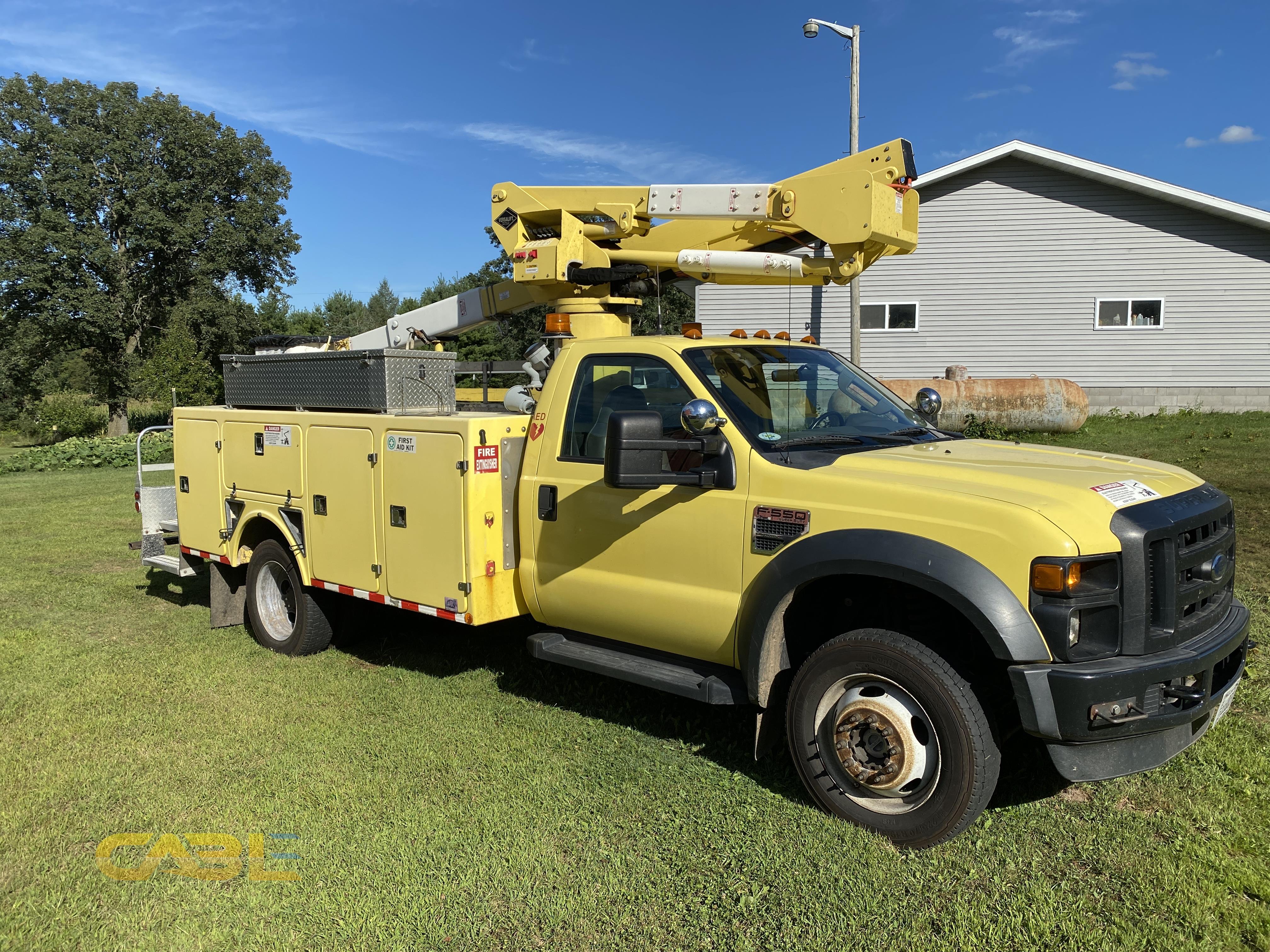 2010 Ford F550 4x4 with 37' Insulated boom.